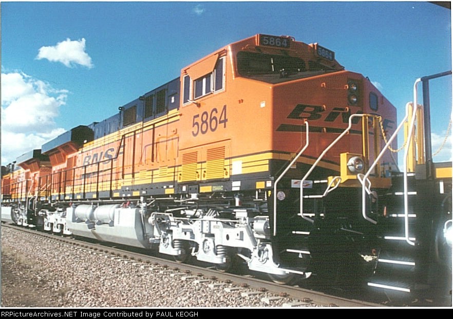 BNSF 5864 second motor in consist of six, in the hole at Aurora, Ne